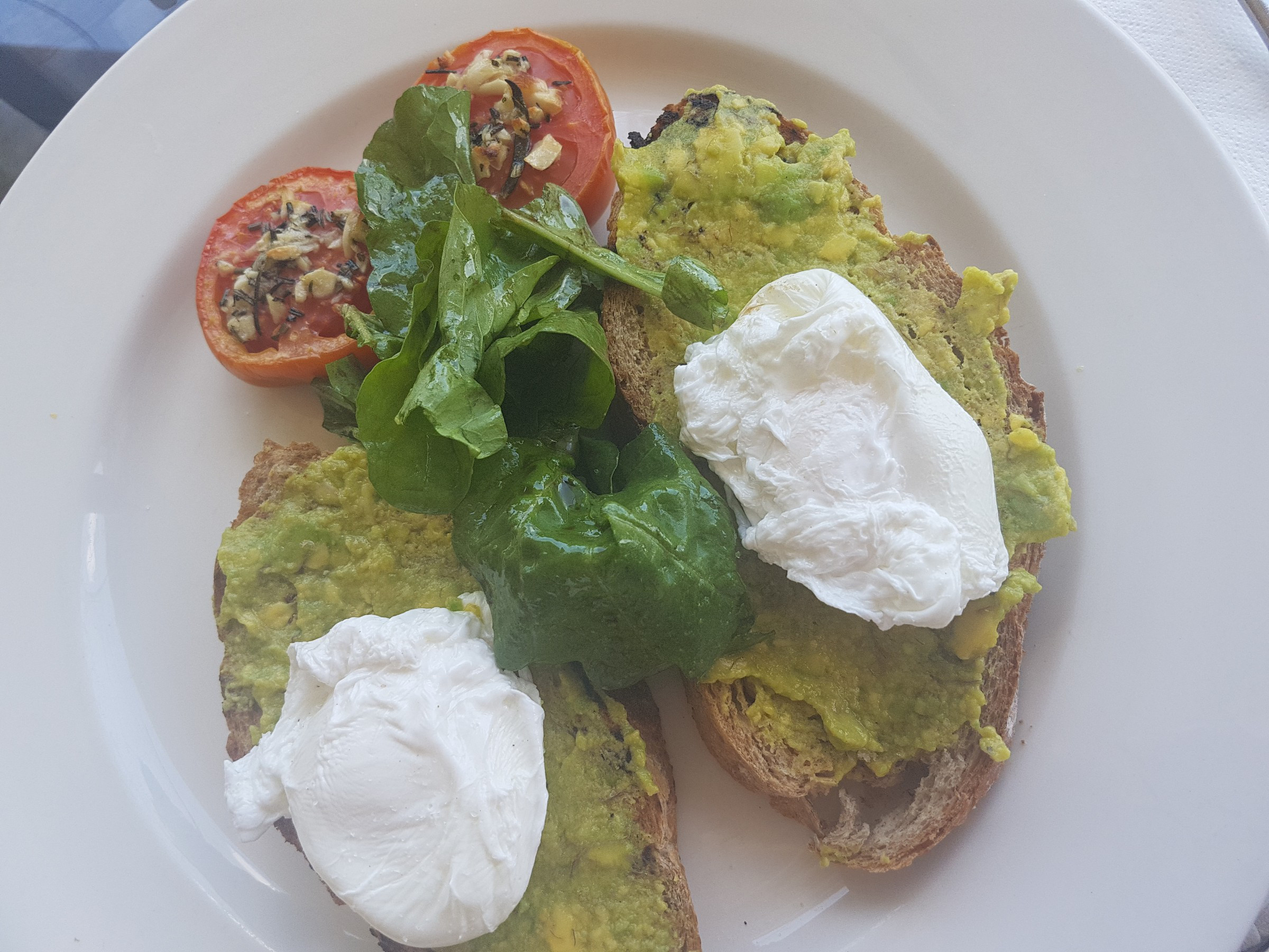 Avocado On Bread With Poached Egg Photo